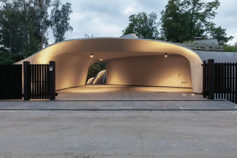 Organic Meets Curved Architectural Design Trend: House in The Landscape ...